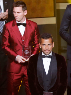 Leo Messi continues his 'brave' fashion choices with resplendent red suit