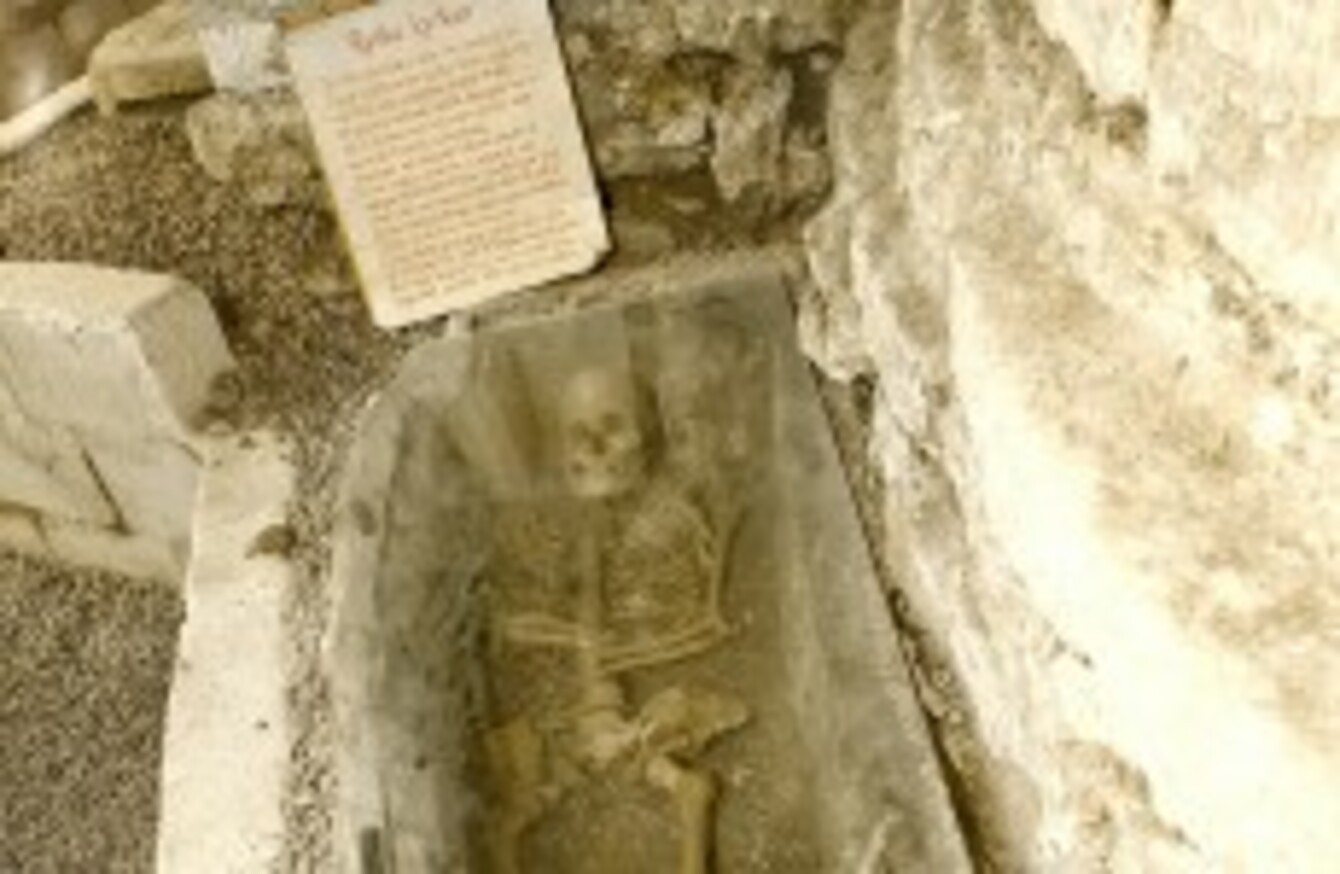 For sale: five bedroomed house complete with hidden tomb and skeleton