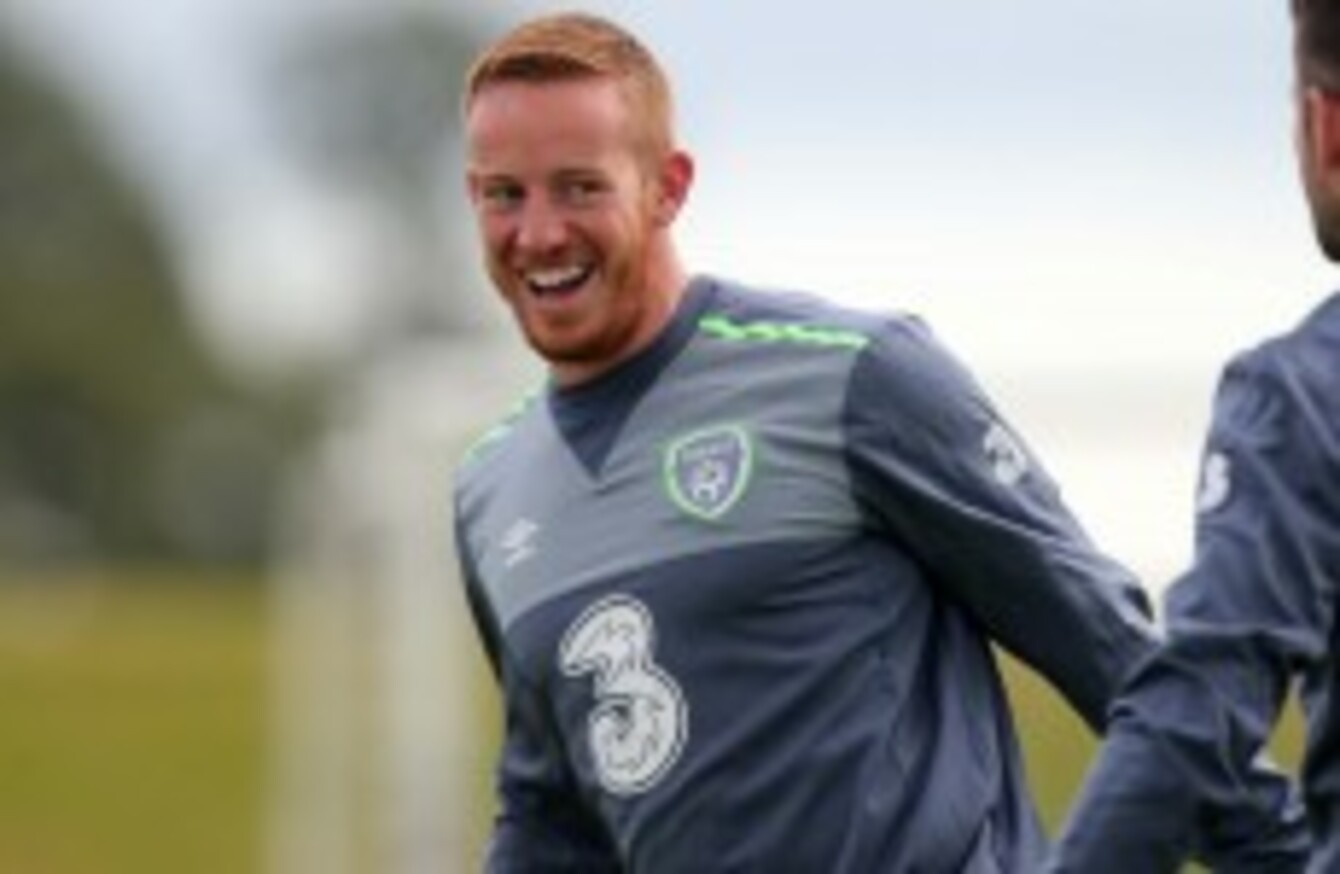 Ireland's new striker Rooney intent on taking his chance after first ...