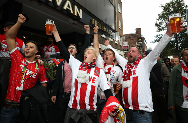 Thousands of FC Koln fans march through the streets of London ahead of ...