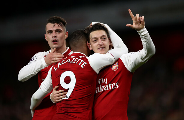 A pulsating Christmas cracker as Arsenal stage comeback to hold ...