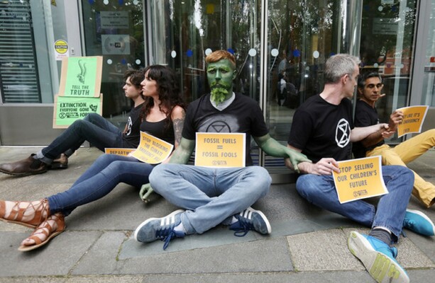 Protesters lock themselves to department doors in protest over Climate ...