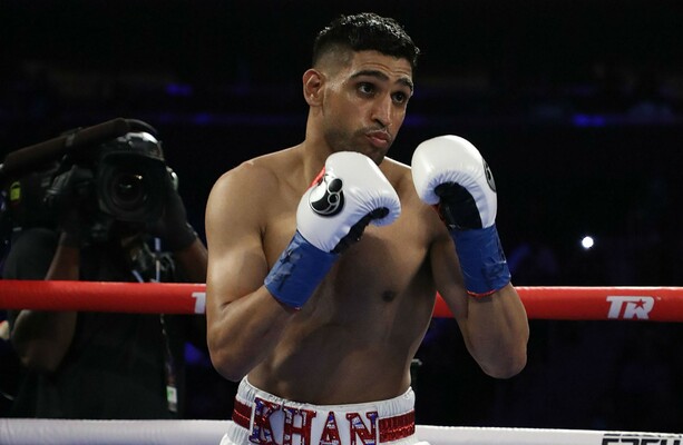 Amir Khan needs less than four rounds to beat Billy Dib in Saudi Arabia