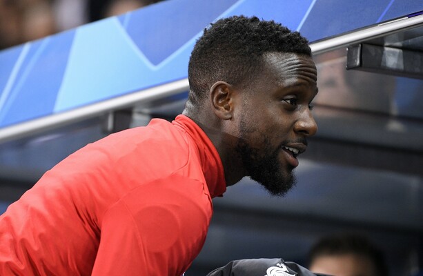 Liverpool condemn fans for 'racist stereotype' Divock Origi banner