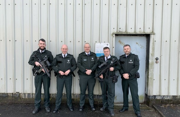 PSNI chief criticised for posing beside officers armed with machine ...
