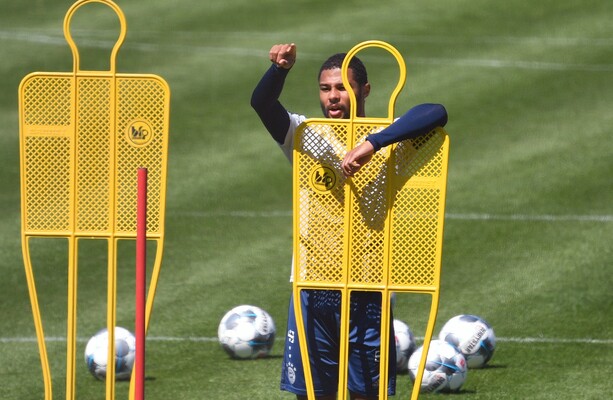 Merkel gives go-ahead for top-level German football to resume in mid-May