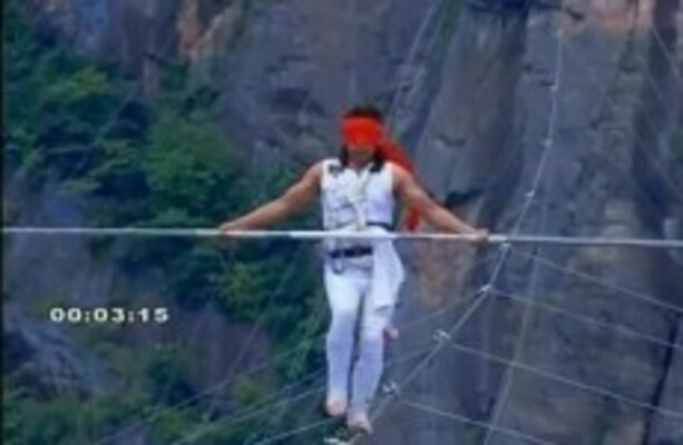 VIDEO: Tightrope walker survives after falling hundreds of feet from wire
