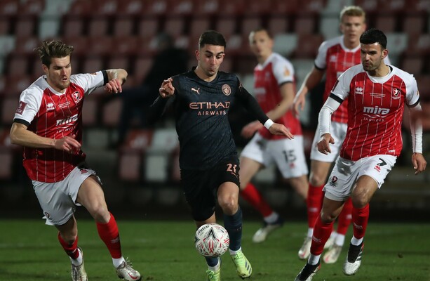 Three goals in final nine minutes rescues Manchester City from shock FA ...