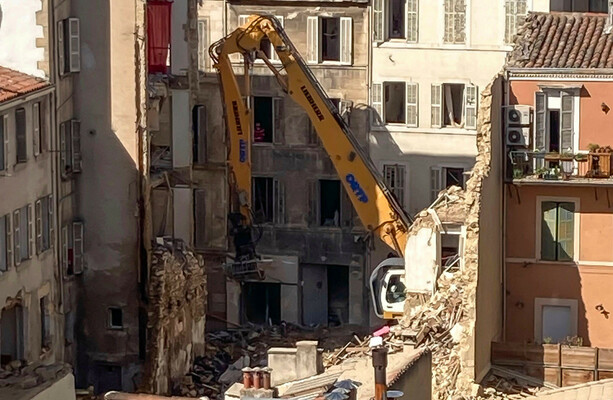 Six killed in Marseille building collapse as search continues for two ...