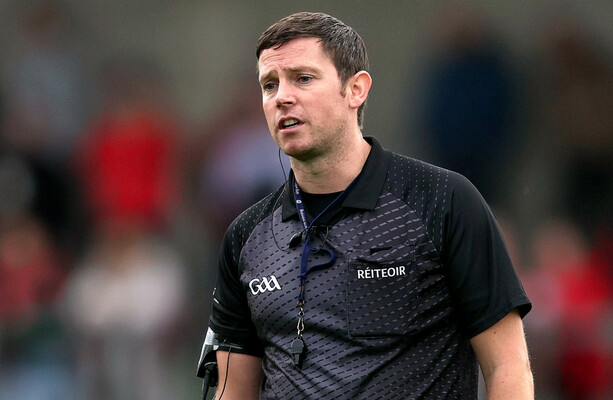 Referee pushed to the ground by spectator after heated finish in ...