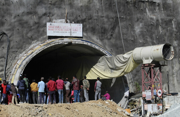 Rescuers prepare to drill through rubble to reach 40 people trapped in ...