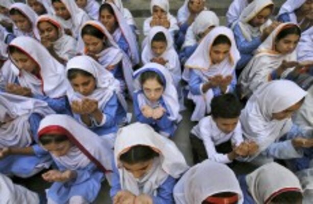 Shot Pakistani schoolgirl, 14, 'showing signs of improvement'