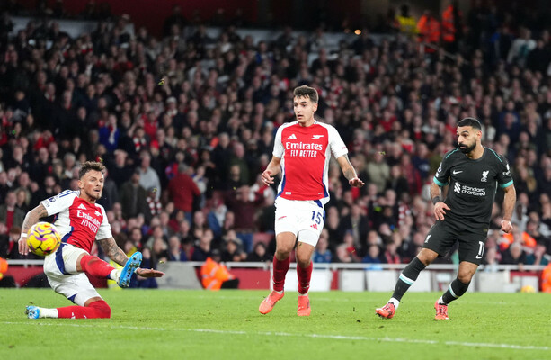 Liverpool fight back twice at Arsenal but stay second in table · The 42