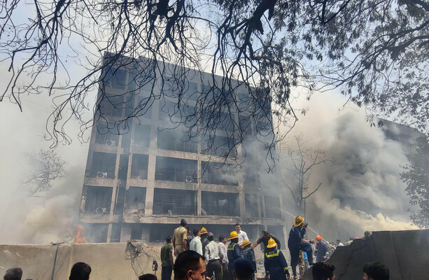 'Many of the bodies were burned': Black smoke rises over the scene of ...