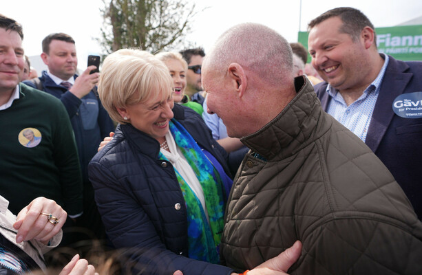 Áras hopefuls embrace the electorate (and each other) at the Ploughing