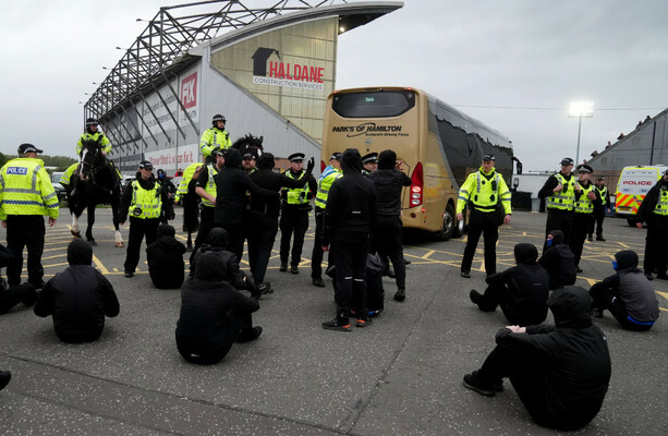 Rangers sack Russell Martin after angry fans protest by blocking team bus
