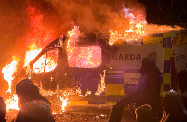 Garda van set alight as large anti-immigration protest turned violent ...