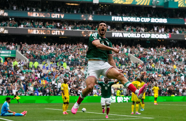 Amid three red cards, Mexico get home World Cup off to flying start