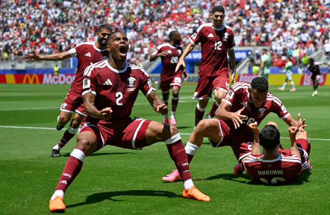 Qatar captain heads 94th-minute equaliser to earn country's first World ...