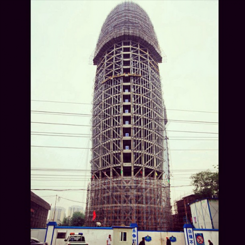 The People's Daily building in China looks like a gigantic, gold-plated ...