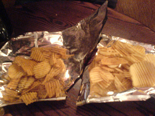 Here's the proper way to open a packet of crisps in the pub