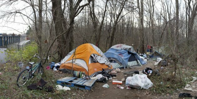 PHOTOS: Baltimore's homeless men make their own shelters from doors and ...