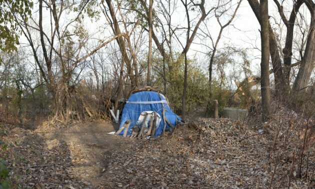 PHOTOS: Baltimore's homeless men make their own shelters from doors and ...