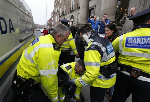 Photos: Four arrests after protesters throw paint at the Department of ...