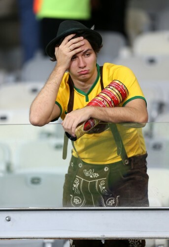 11 utterly devastated football fans mourning Brazil's World Cup defeat