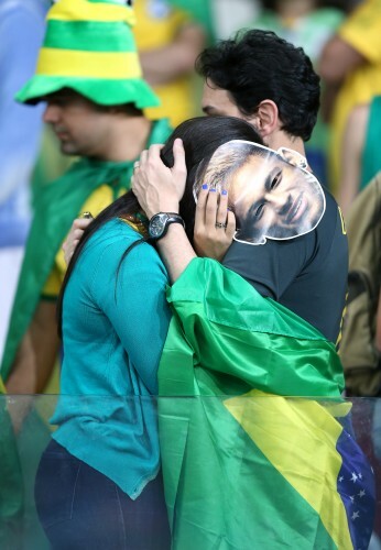 11 utterly devastated football fans mourning Brazil's World Cup defeat