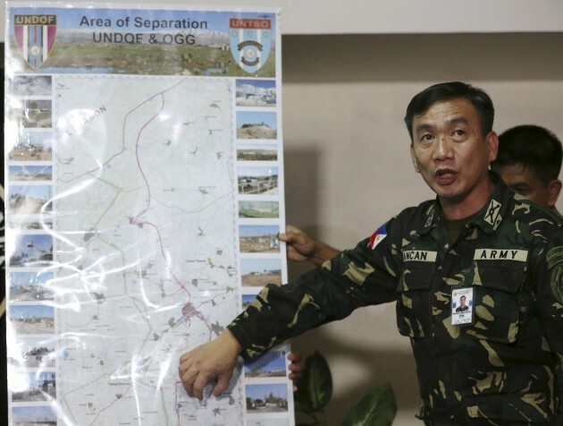 Filipino UN peacekeepers defy Syrian rebels in Golan Heights standoff