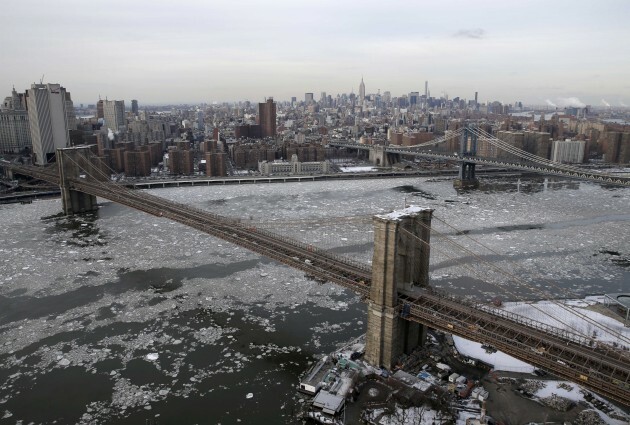 Manhattan surrounded by ice is the craziest - and most beautiful ...