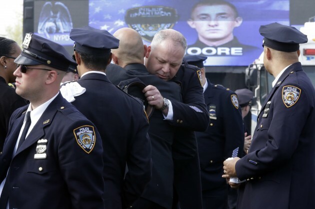 Thousands bid farewell to NYPD officer who was shot in the head by an ...