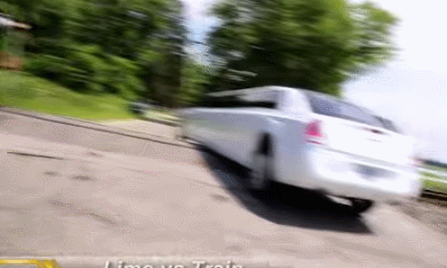 Watch the dramatic moment a freight train smashed into a limo