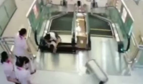 Chinese woman manages to save her son but is killed by shopping centre ...