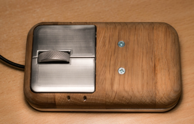 Sick of his old mouse, this guy decided to make his own...from wood