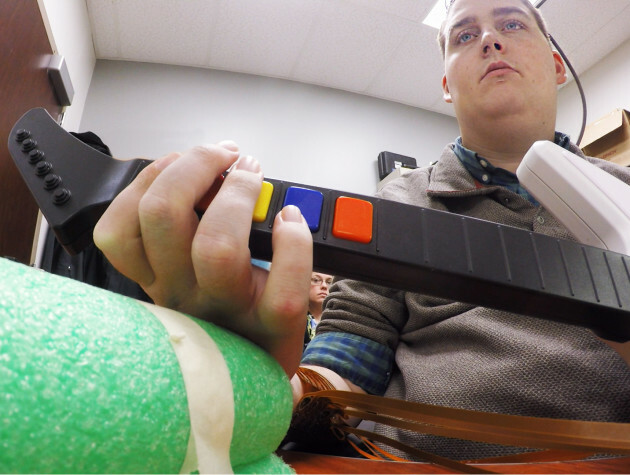 Paralysed man can now use his hand thanks to pioneering software
