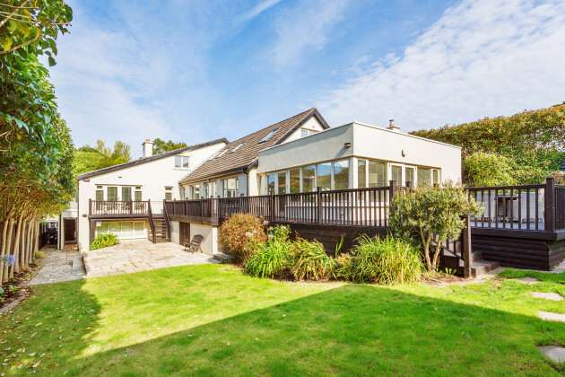 Explore this sprawling luxury Dublin villa that comes with its own log ...