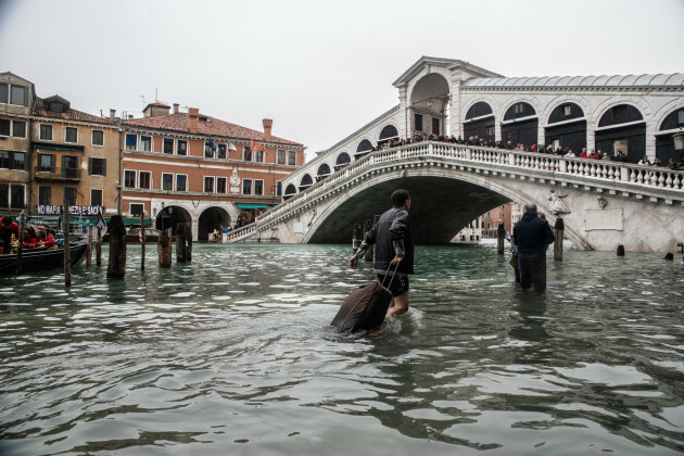 Venice hit by heavy flooding as 11 people die in storms across Italy