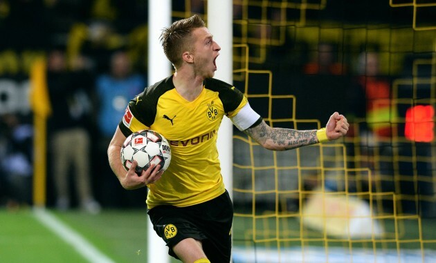 Reus helps Dortmund twice come from behind and beat Bayern Munich