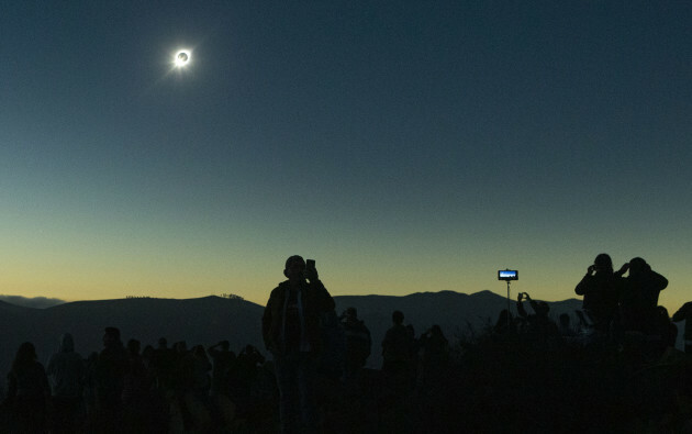 PHOTOS: Thousands turn out to watch rare total solar eclipse in South ...