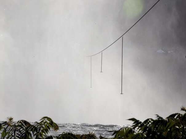 In pictures: Daredevil successfully walks tightrope across Niagara Falls
