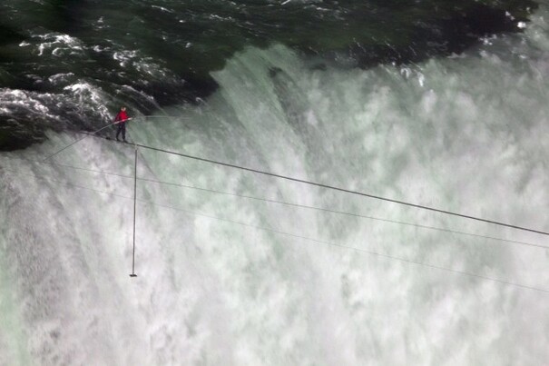 In pictures: Daredevil successfully walks tightrope across Niagara Falls
