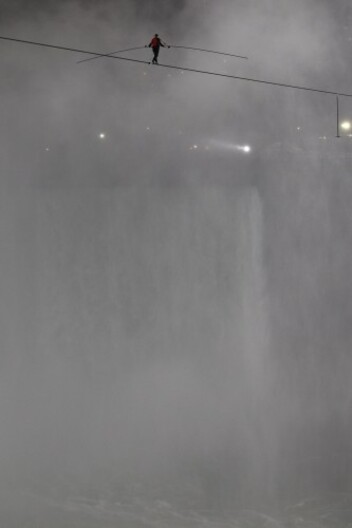 In pictures: Daredevil successfully walks tightrope across Niagara Falls