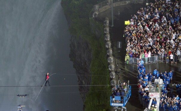 In pictures: Daredevil successfully walks tightrope across Niagara Falls