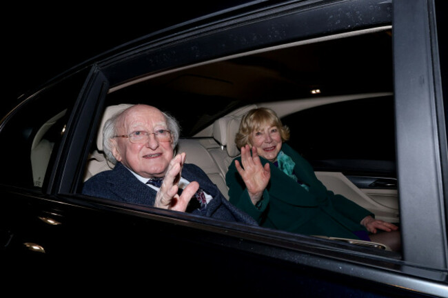 President Higgins and wife Sabina given roses and cheered as they leave ...