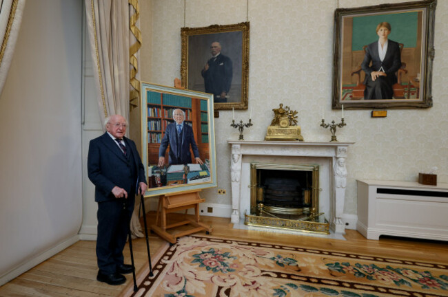 President Higgins and wife Sabina given roses and cheered as they leave ...