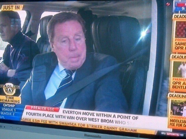 BREAKING: The first deadline day pic of Harry hanging out his car window