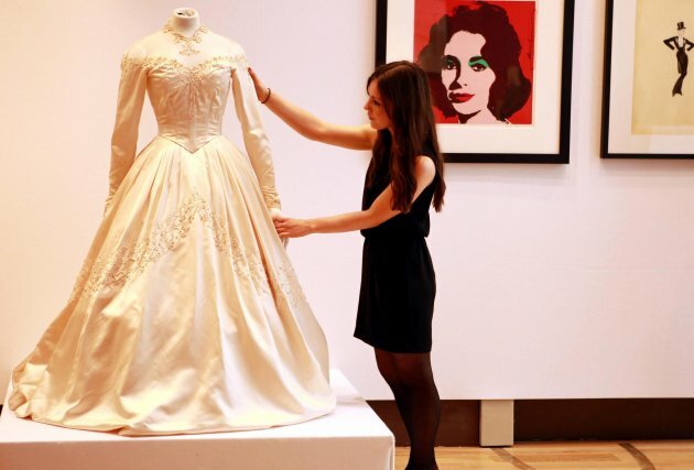 Sold! Elizabeth Taylor's wedding dress, Cobain's guitar and Bond's watch